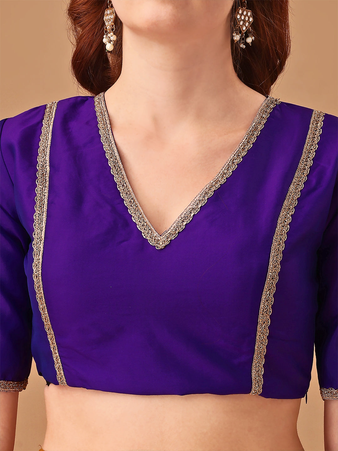 Violet colored half sleeves tafeta blouse with lace embellishments